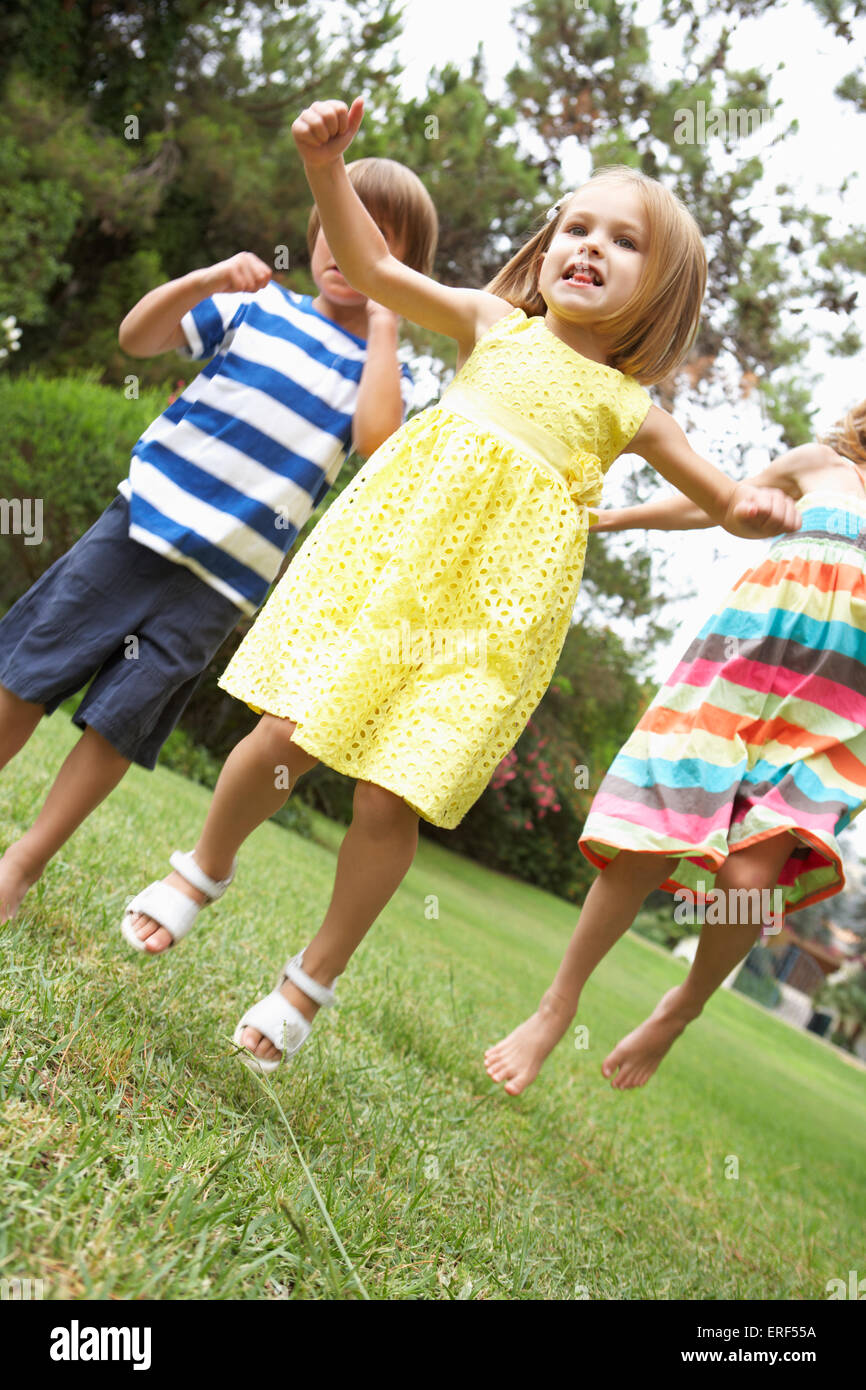Group Of Children Playing Outdoors Together Stock Photo - Alamy