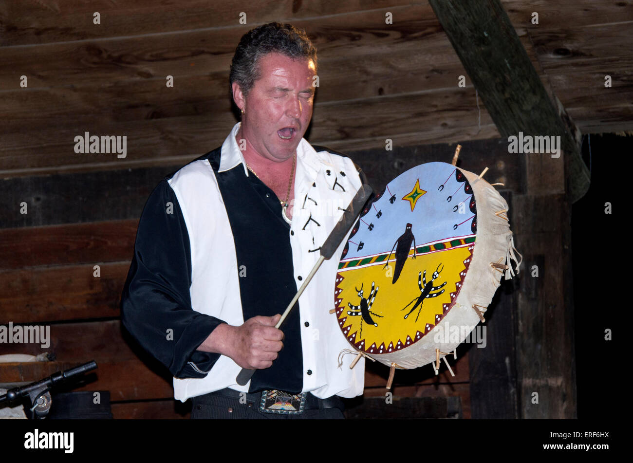 Native american indian beating drum hi-res stock photography and images ...