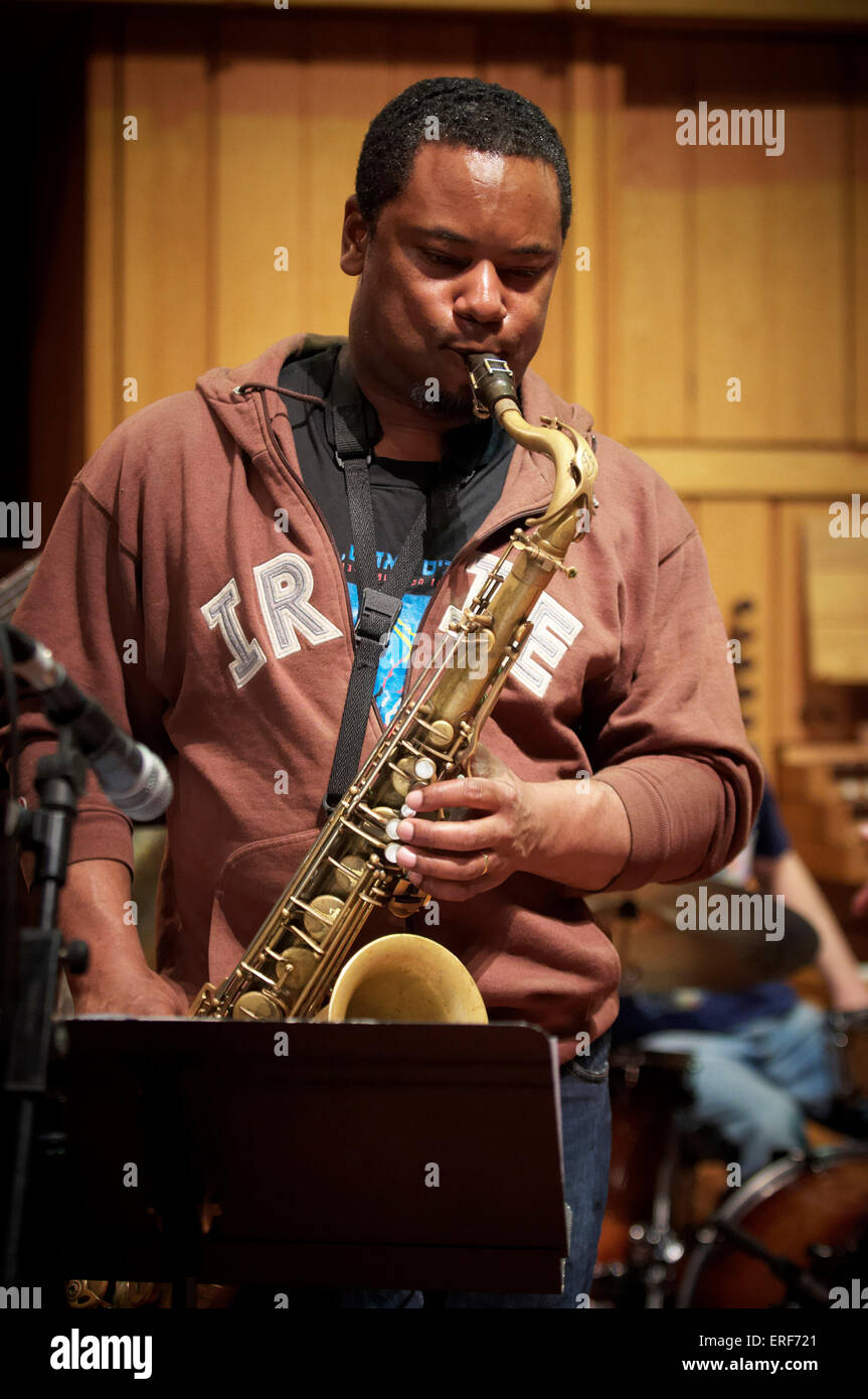 Denys Baptiste playing tenor saxophone during sound checks at the ...