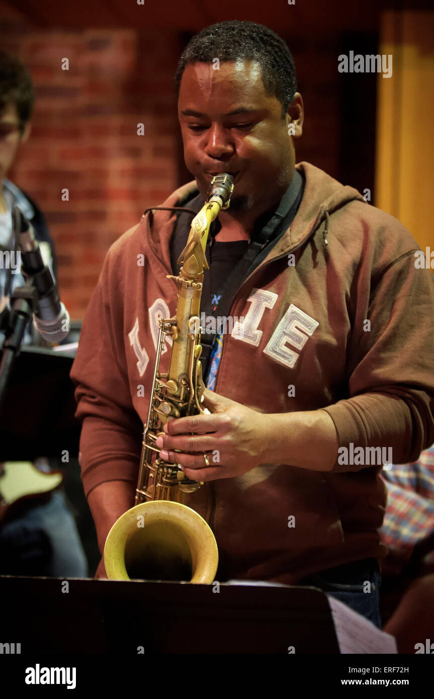 Denys Baptiste playing tenor saxophone during sound checks at the ...