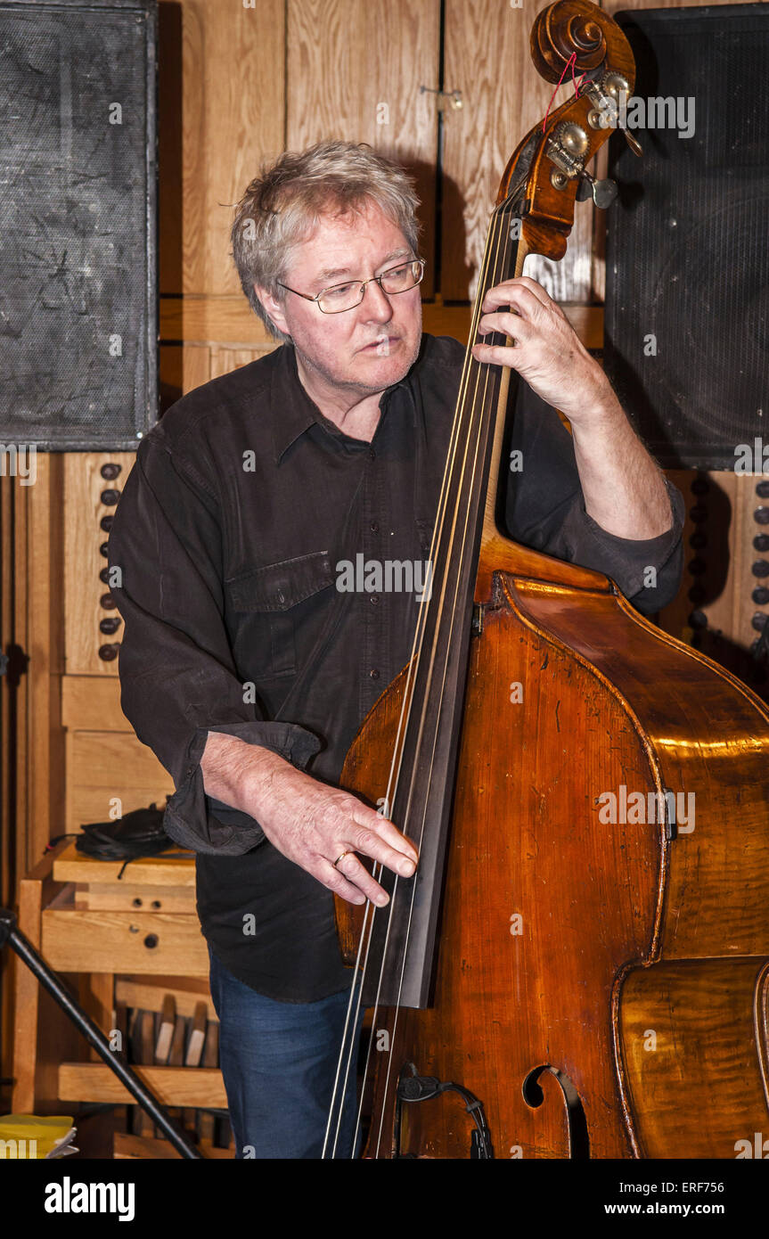 Arild Andersen, the Norwegian acoustic bass player, at warm up with the ...