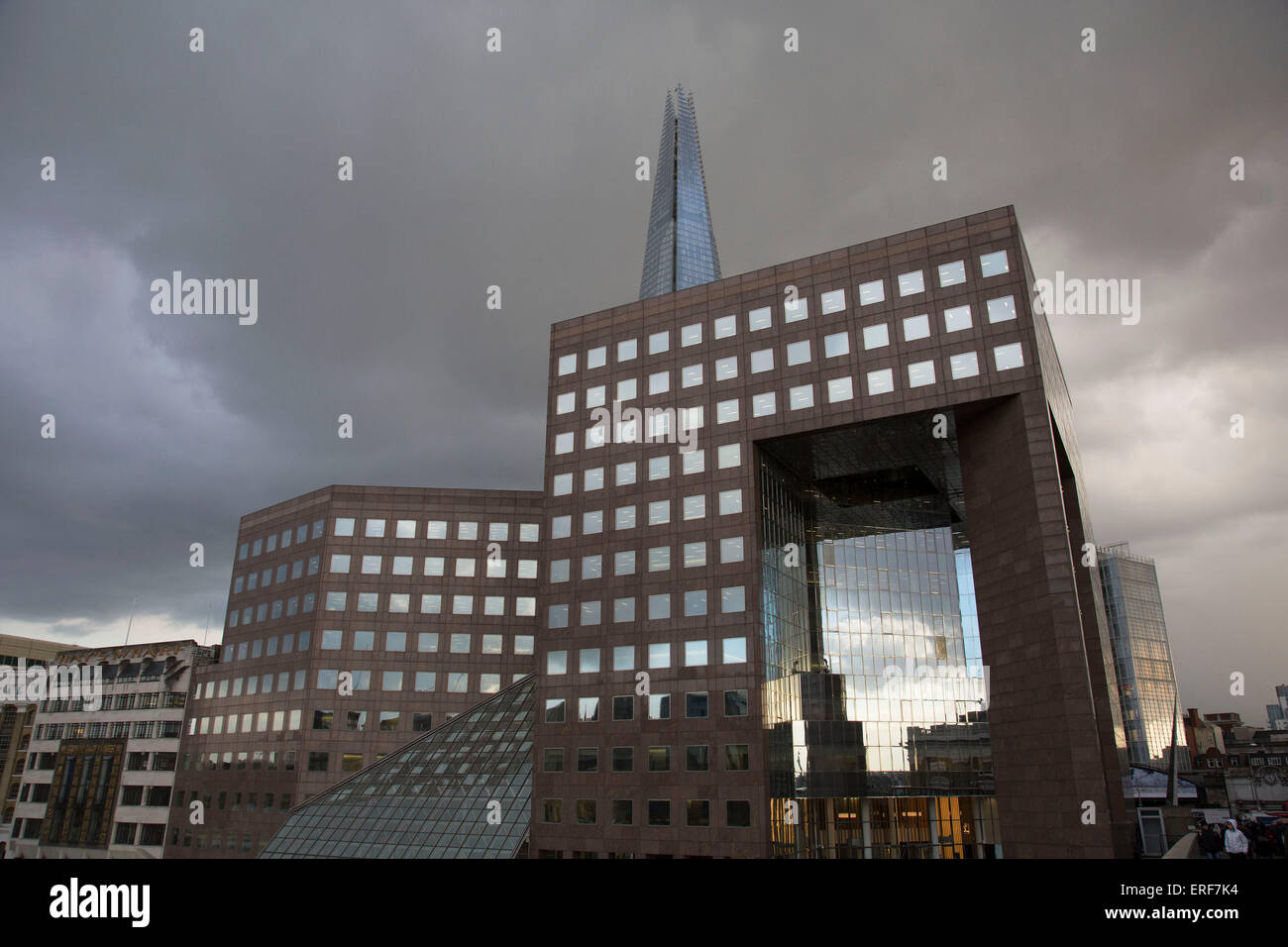 The Shard looming over the Price Waterhouse Coopers building on cloudy ...