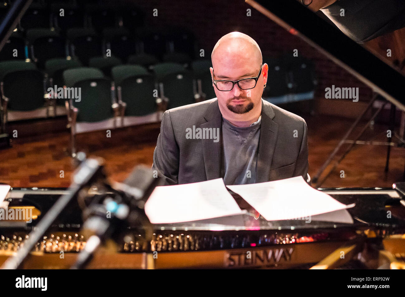 Ethan Iverson playing piano during sound check with The Bad Plus at the ...