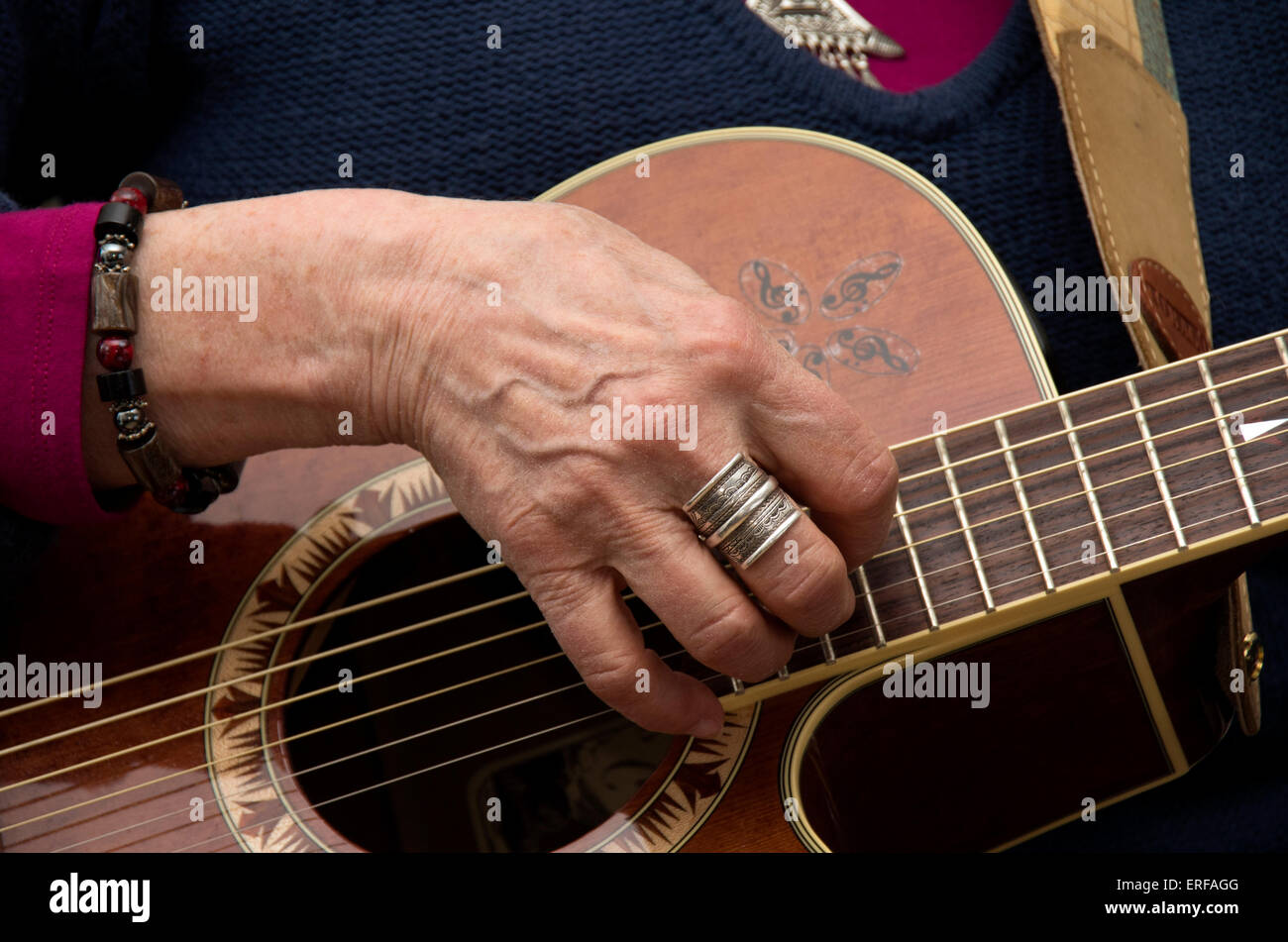 Hand plucking strings hi-res stock photography and images - Alamy