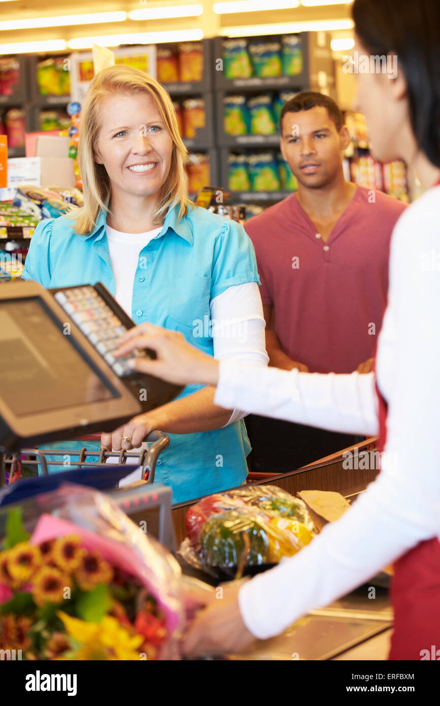 Customer Paying For Shopping At Supermarket Checkout Stock Photo - Alamy