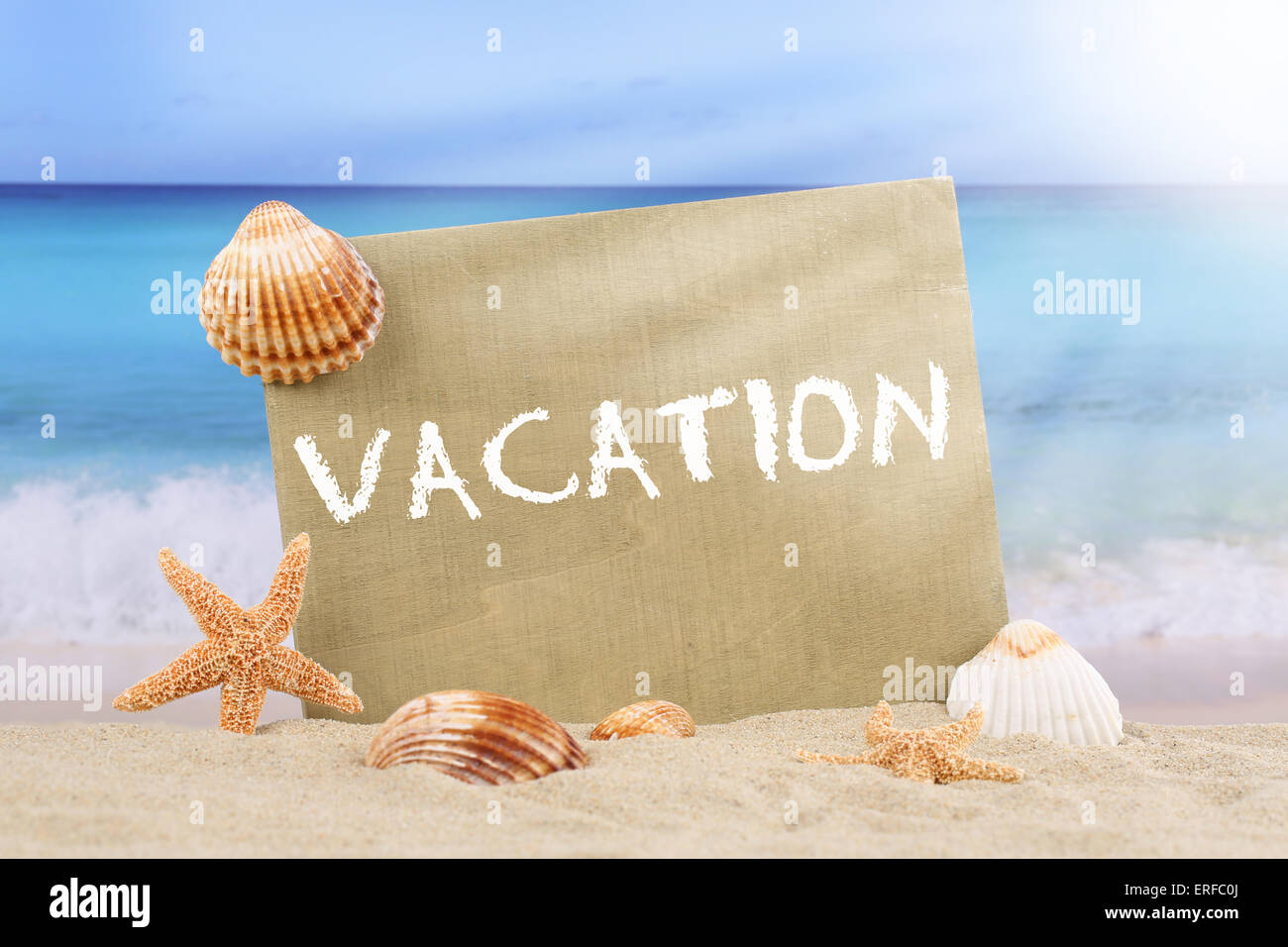 Beach scene in summer on vacation with sand, sea shells and stars Stock ...