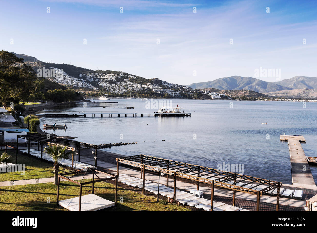 Jetty in the Akyarlar region of Turkey with clear Aegean sea and white ...