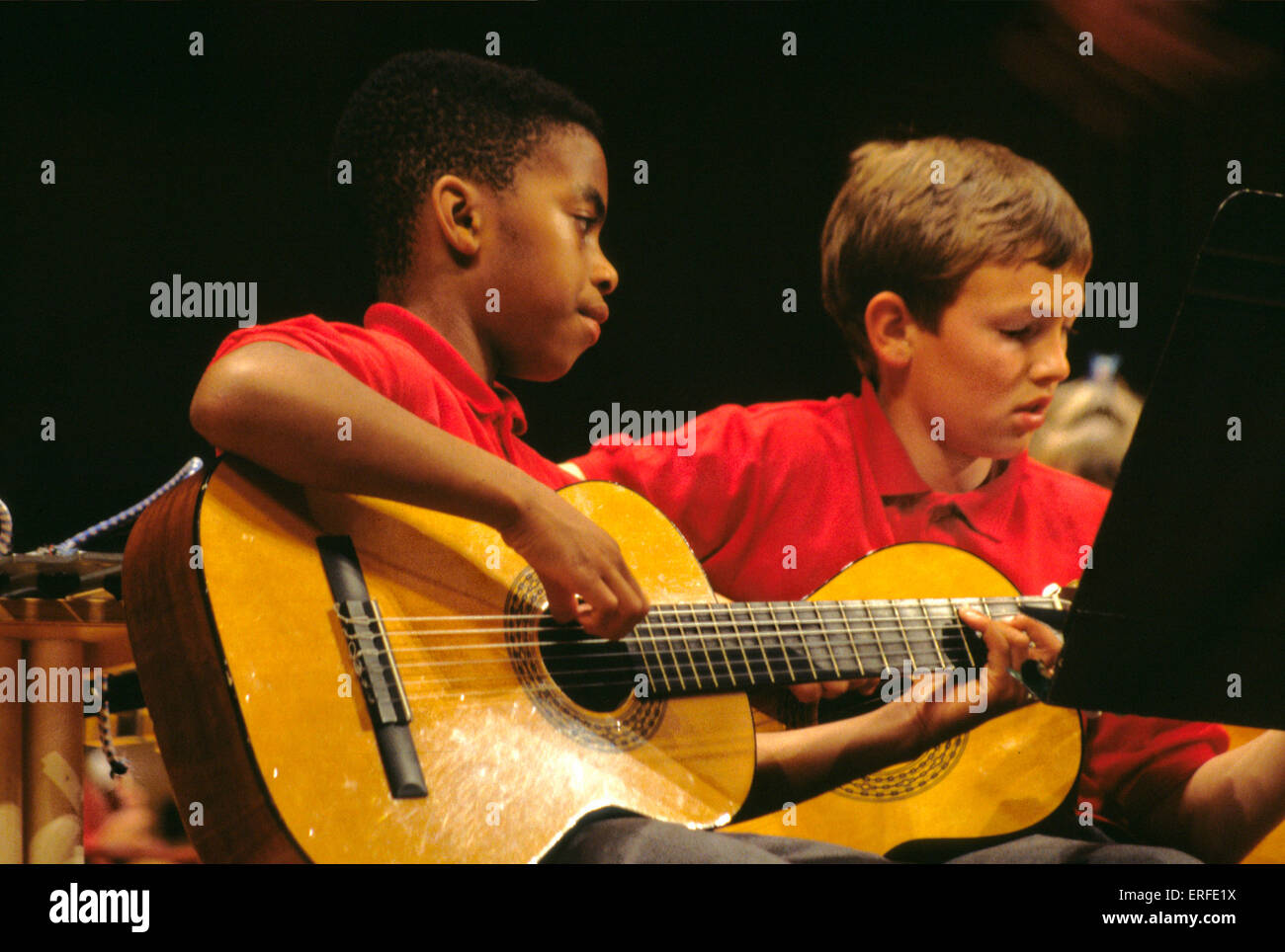 Playing stringed instruments hi-res stock photography and images - Alamy