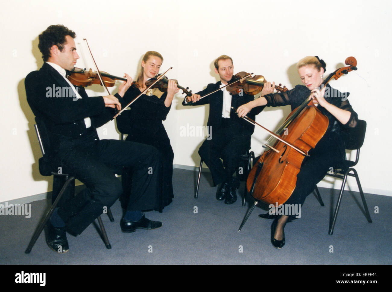 String Quartet Playing Classical Music High Resolution Stock ...
