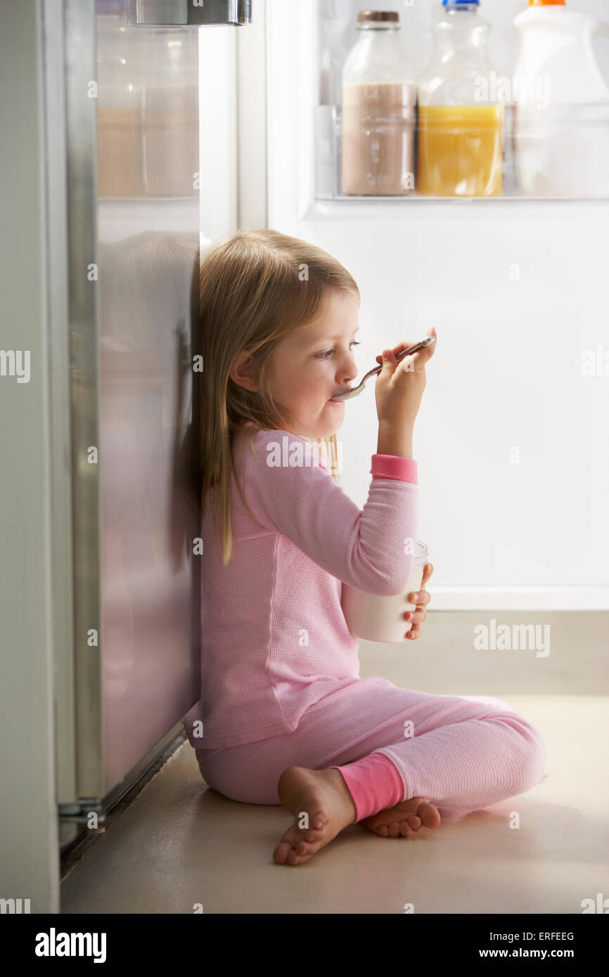 Girl Raiding The Fridge Stock Photo - Alamy