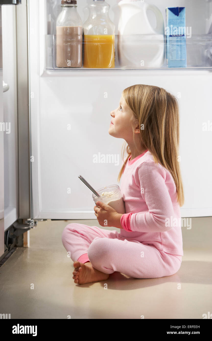 Girl Raiding The Fridge Stock Photo - Alamy