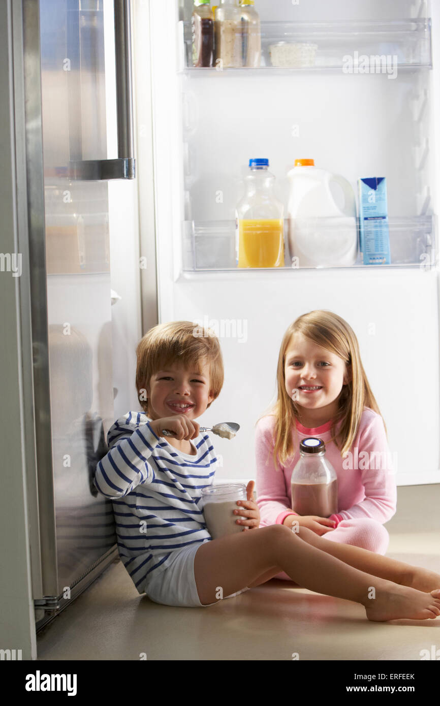 Children Raiding The Fridge Stock Photo - Alamy
