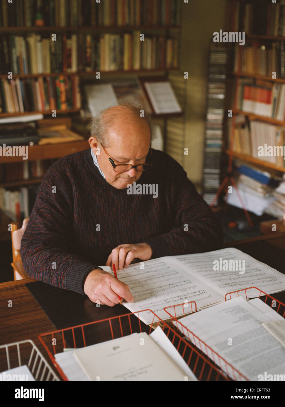 Alun Hoddinott on his 75th birthday, reading a score in study. Welsh ...