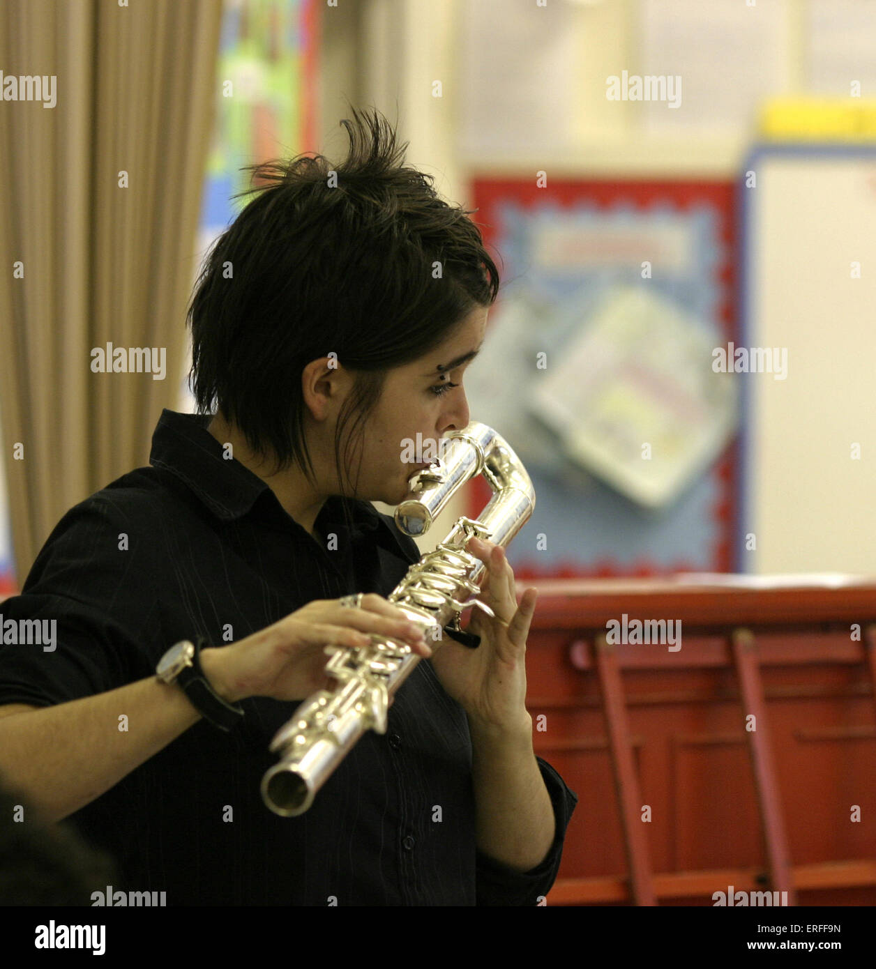 Tina Hitchens playing bass flute Stock Photo - Alamy