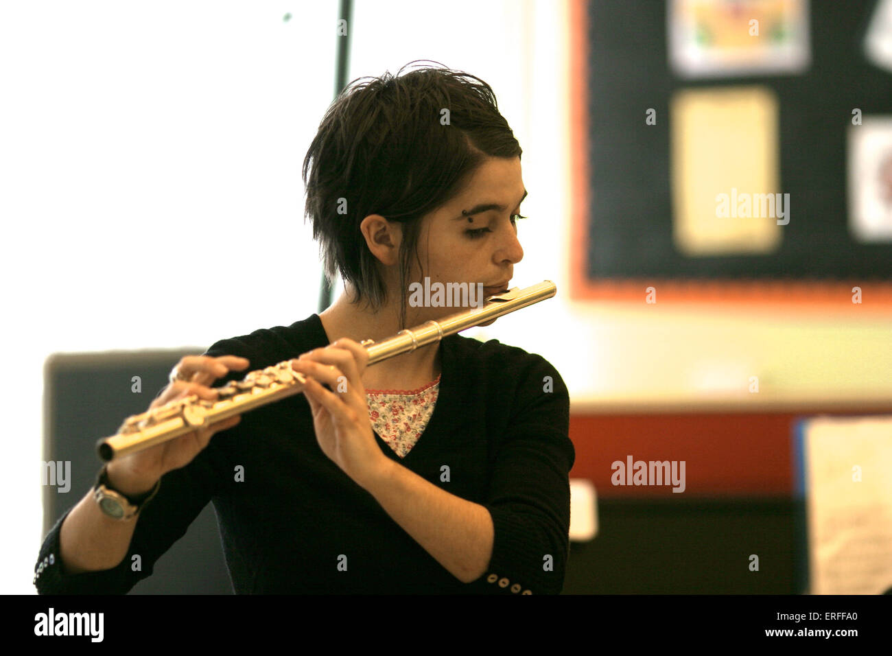Tina Hitchens playing flute Stock Photo - Alamy
