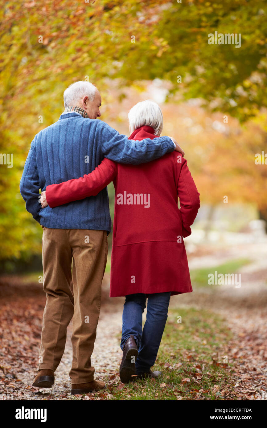 Rear View Of Senior Couple Walking Along Autumn Path Stock Photo - Alamy Rear View Of Senior Couple Walking Along Autumn Path Stock Photo - Alamy