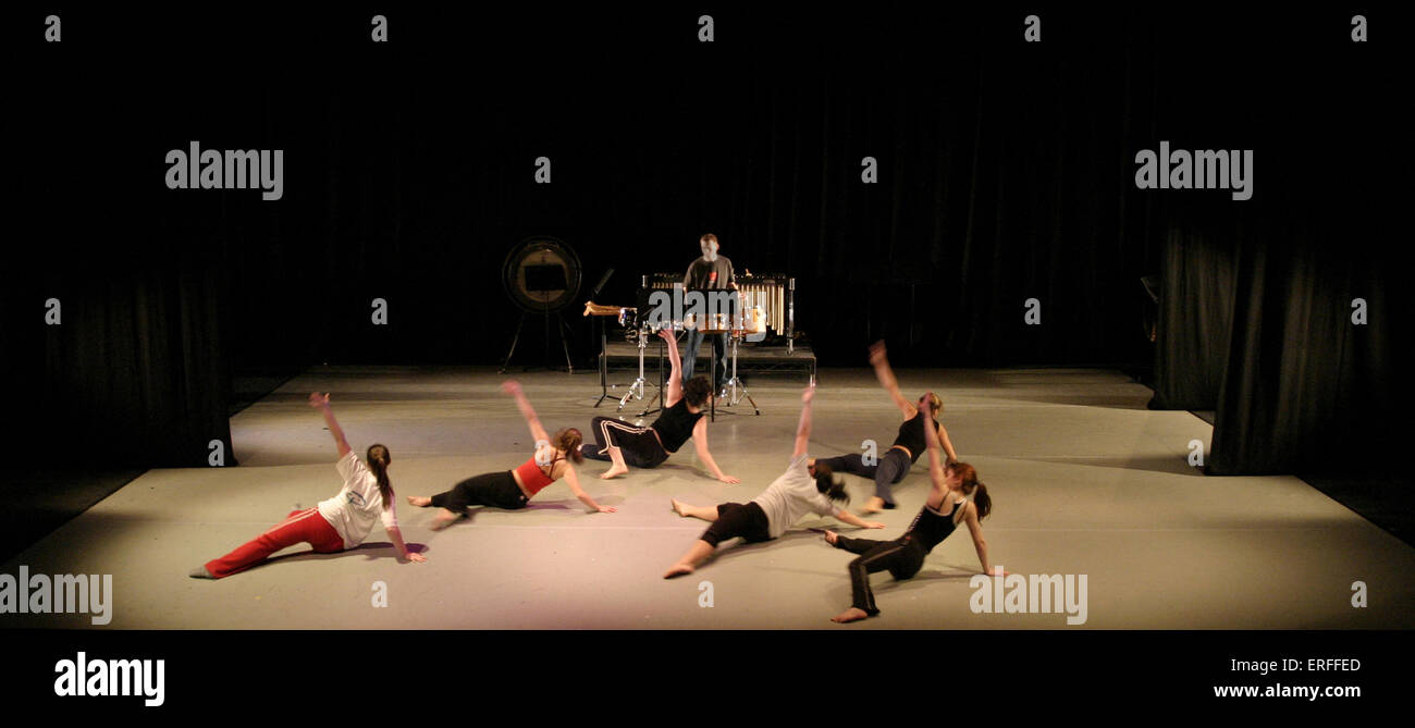 Dancers with Rubicon Dance company performing on stage with solo ...