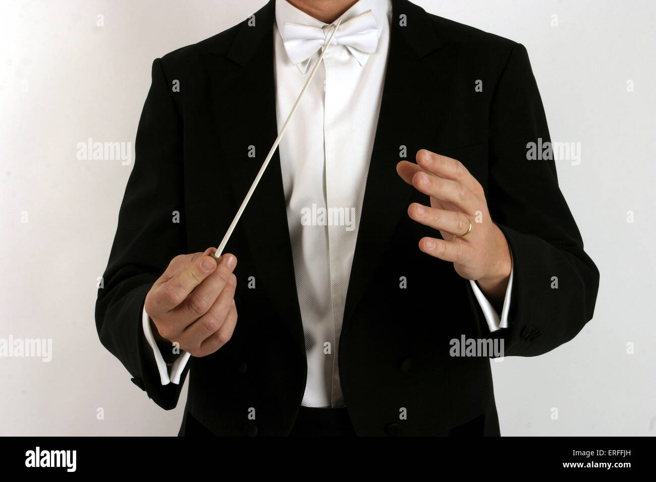 Conductor beating time with baton - Position of Beat 1. Shoulders and ...