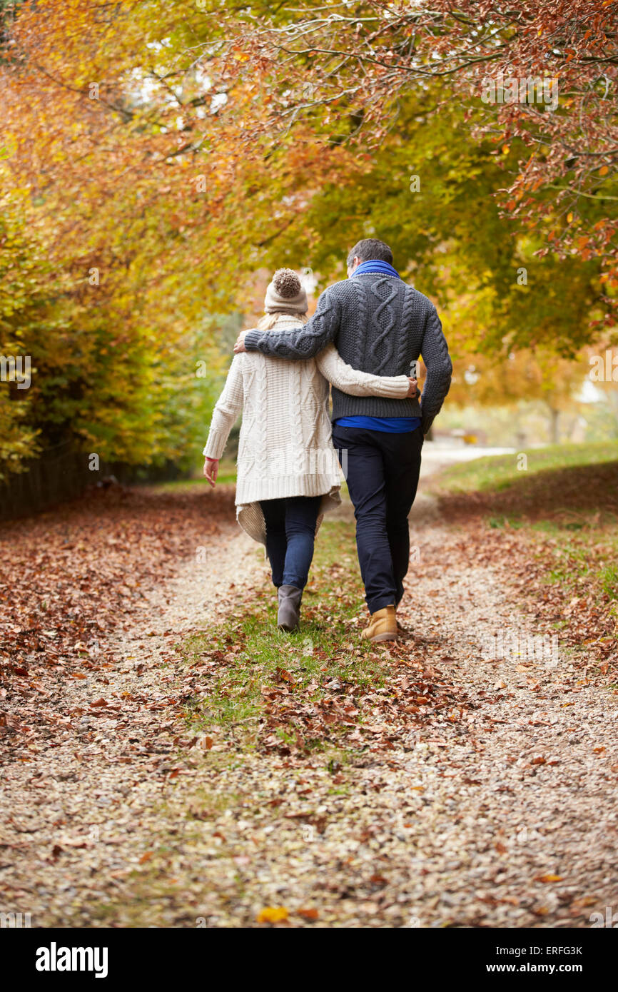 Rear View Of Couple Walking Along Autumn Path Stock Photo - Alamy Rear View Of Couple Walking Along Autumn Path Stock Photo - Alamy