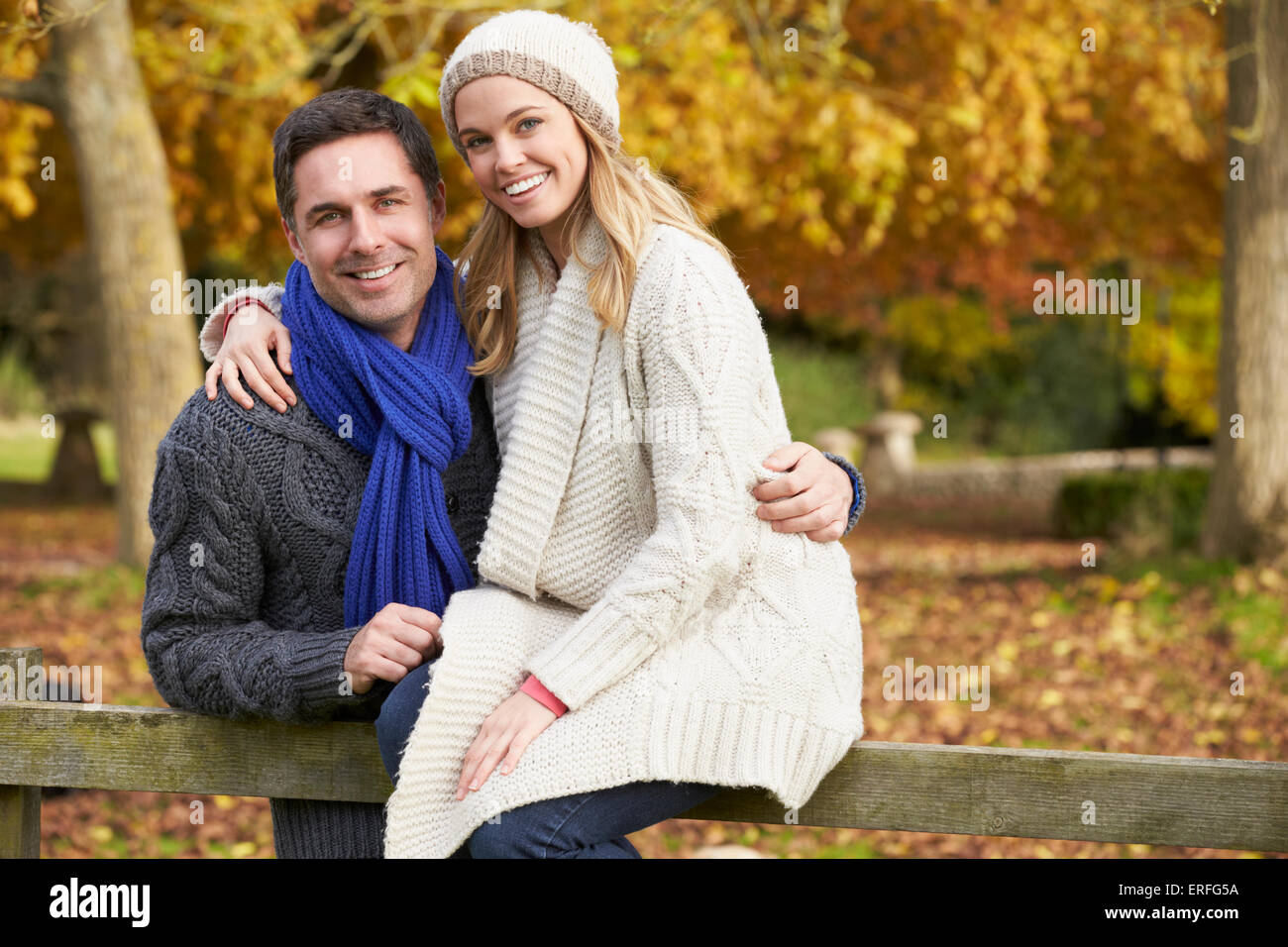 Women sitting on fence hi-res stock photography and images - Alamy
