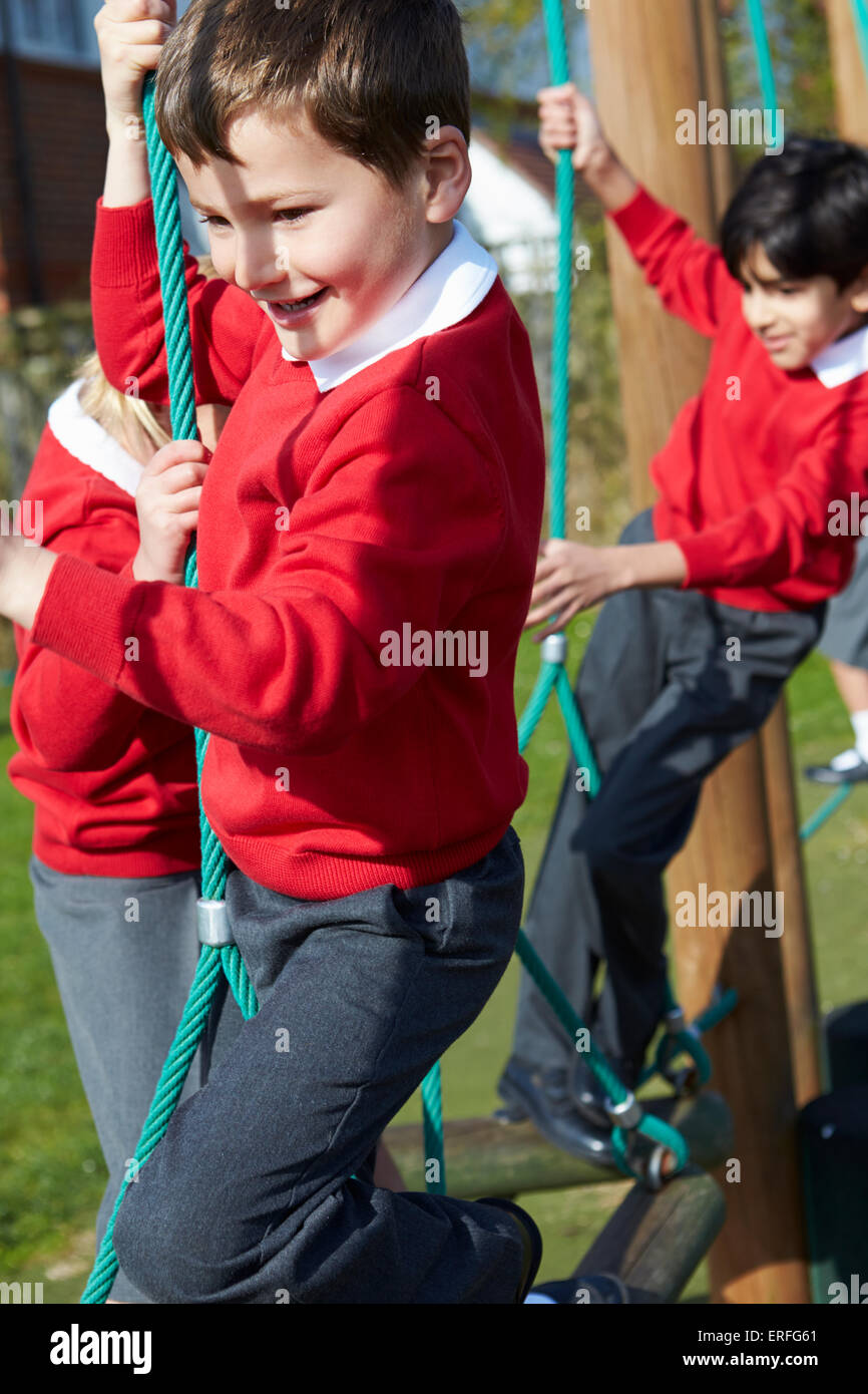 Elementary School Pupils On Climbing Equipment Stock Photo - Alamy