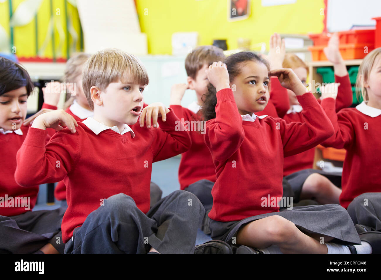Pupils Perfoming Actions Whilst Singing Song Stock Photo - Alamy