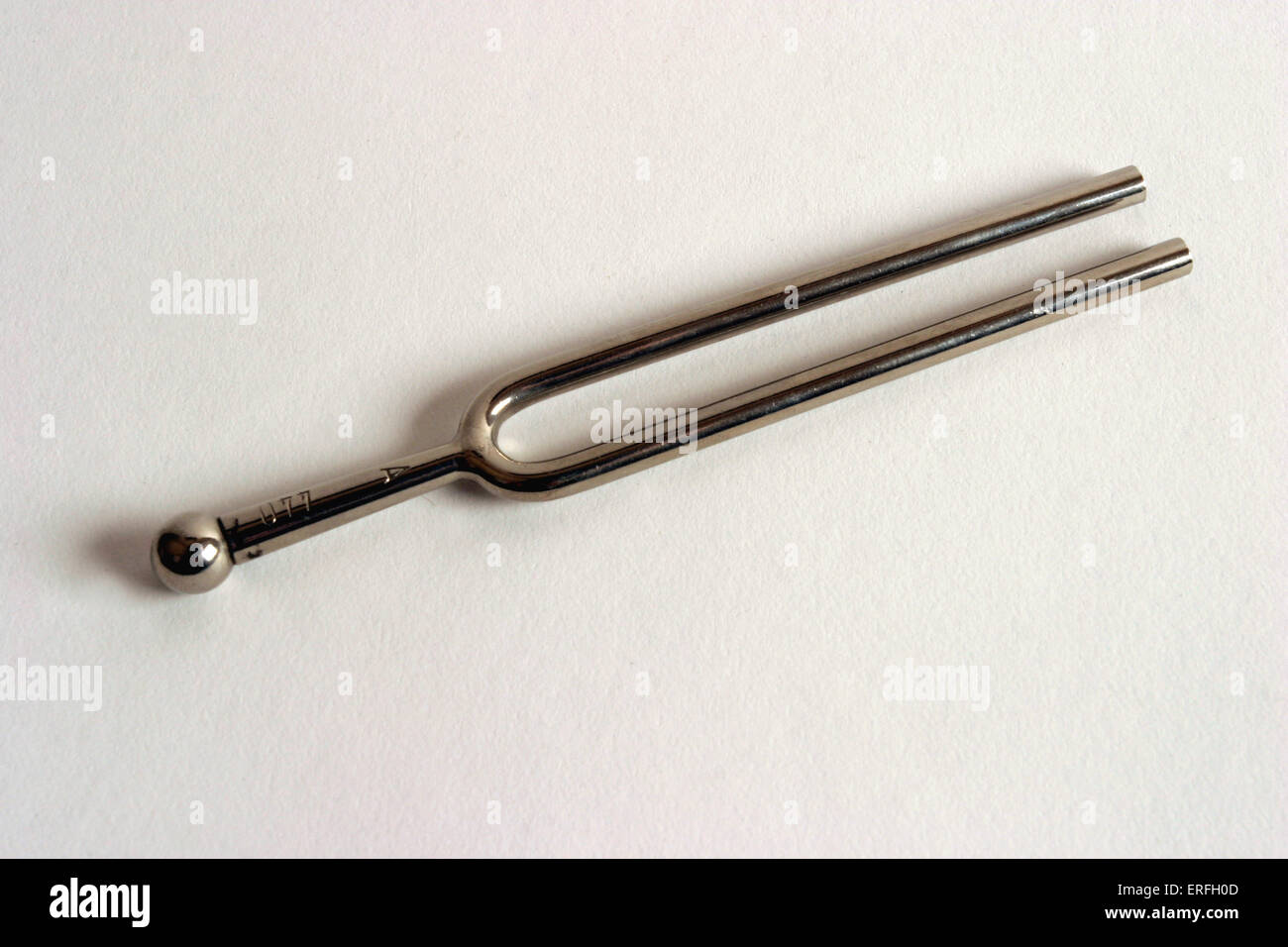 Tuning fork tuned to A Stock Photo - Alamy