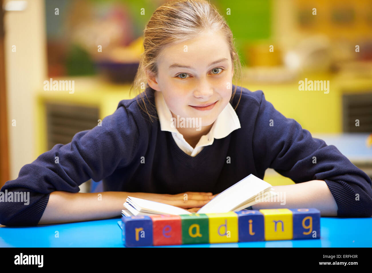 Word "Learning" Spelt In Wooden Blocks With Pupil Behind Stock Photo ...