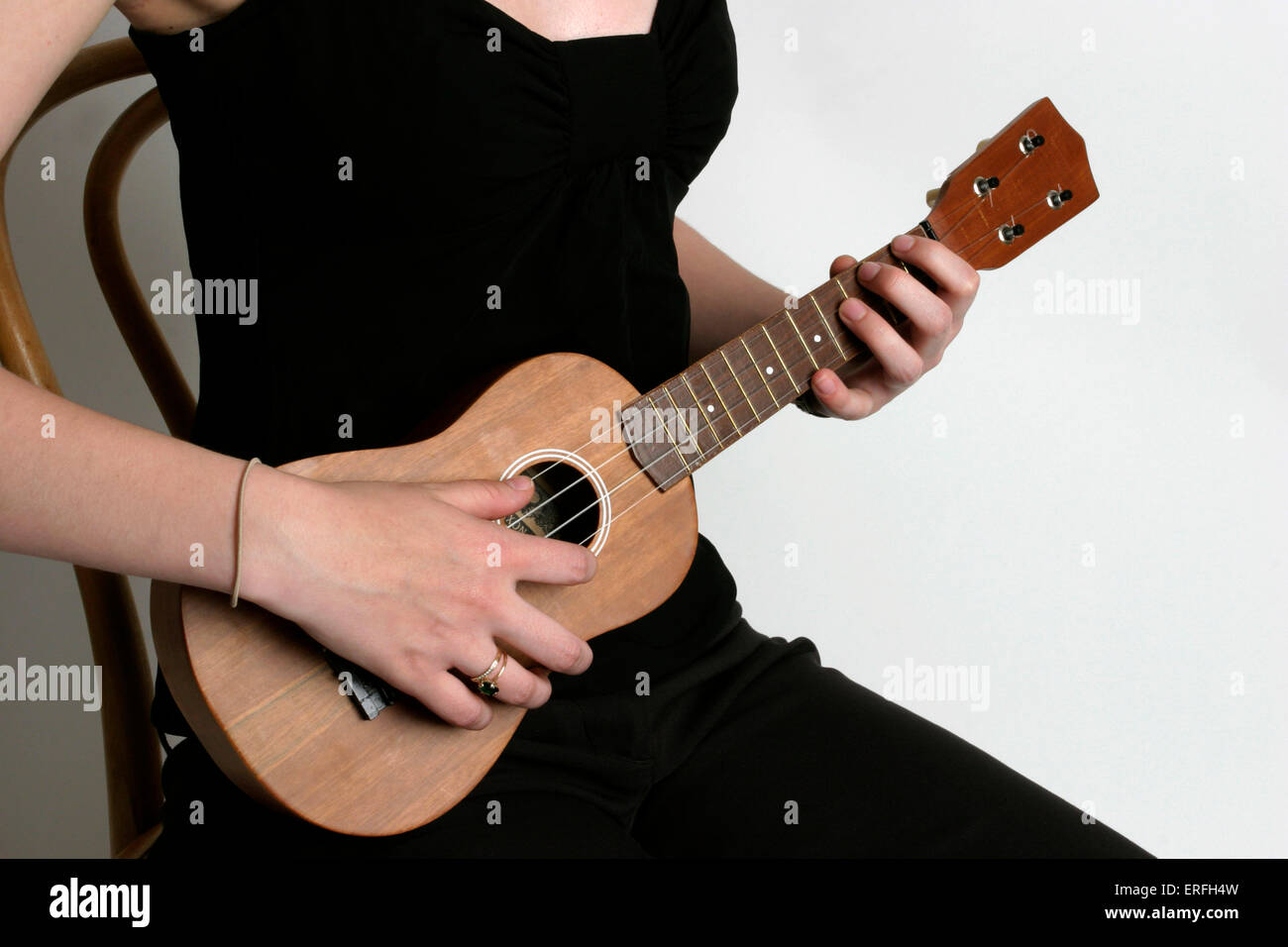 Ukulele in playing position Stock Photo - Alamy