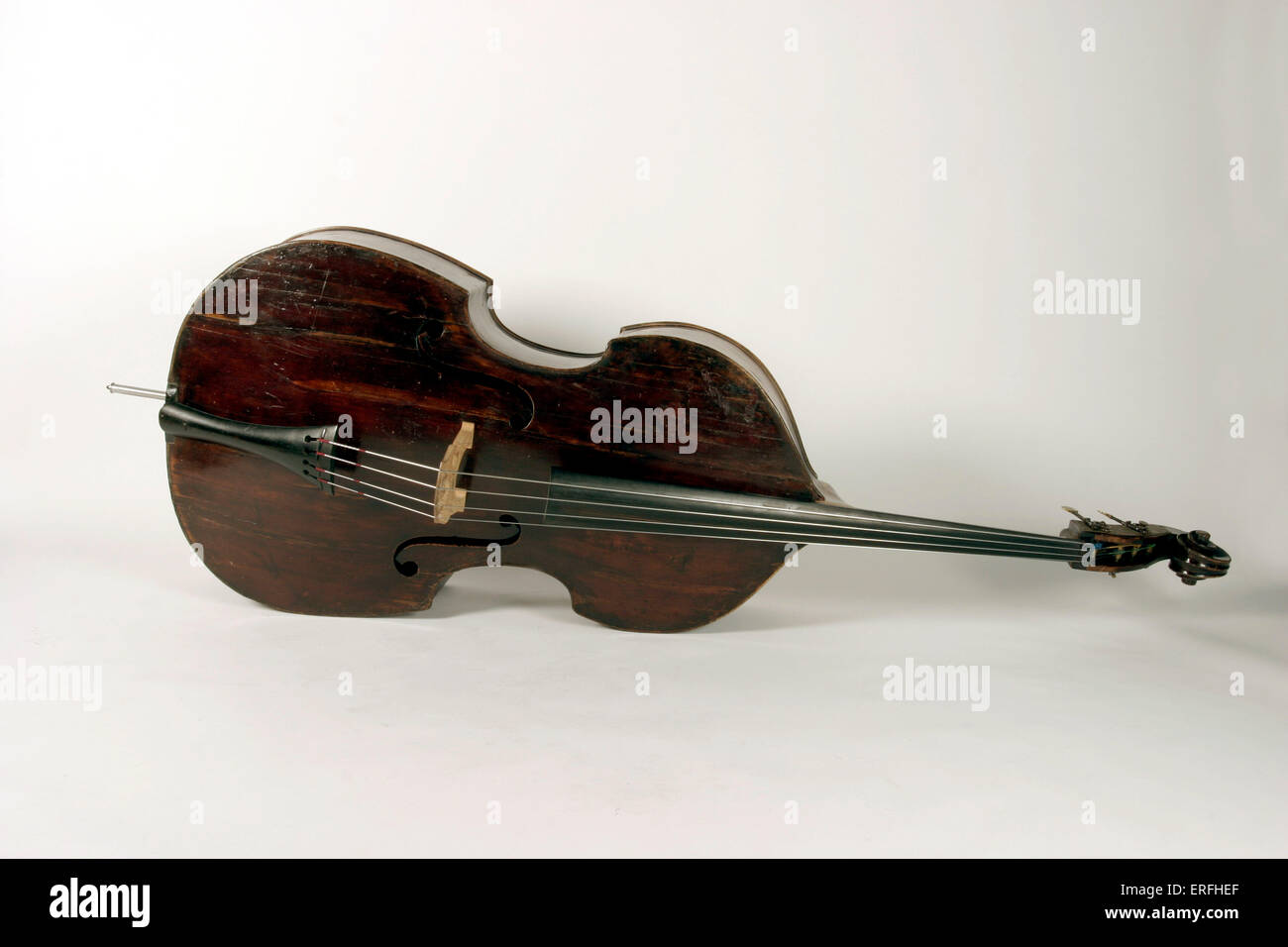 Double Bass - view of the instrument laying on its side Stock Photo - Alamy