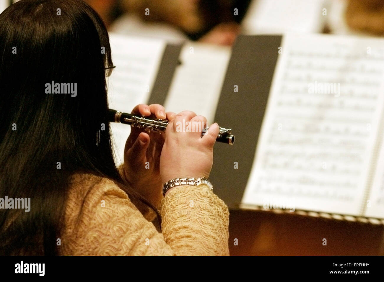 Piccolo in playing position during a rehearsal Stock Photo - Alamy
