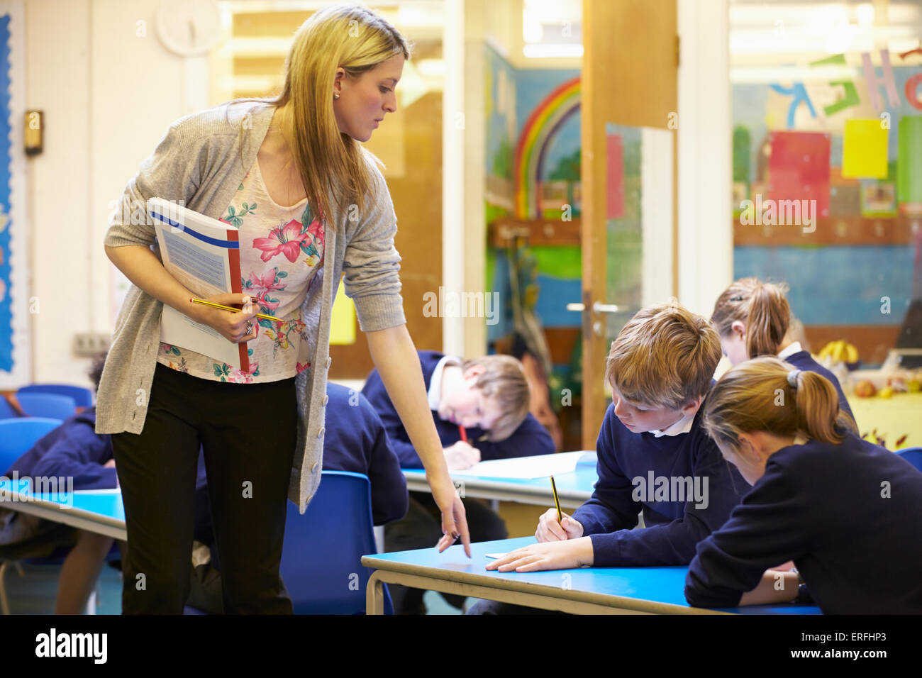 Children sitting exam school uniform hi-res stock photography and ...
