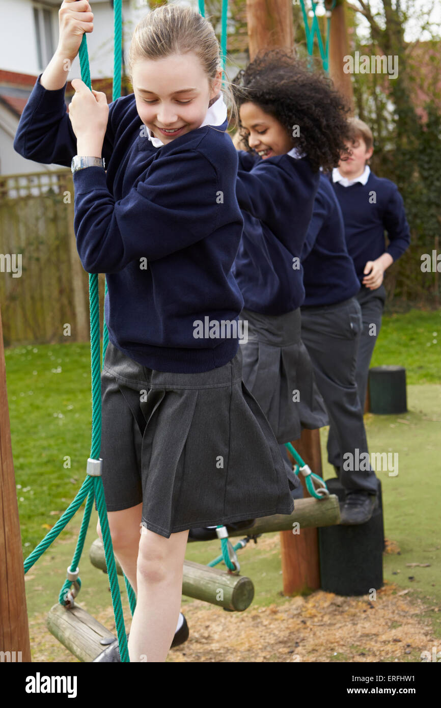 Elementary School Pupils On Climbing Equipment Stock Photo - Alamy
