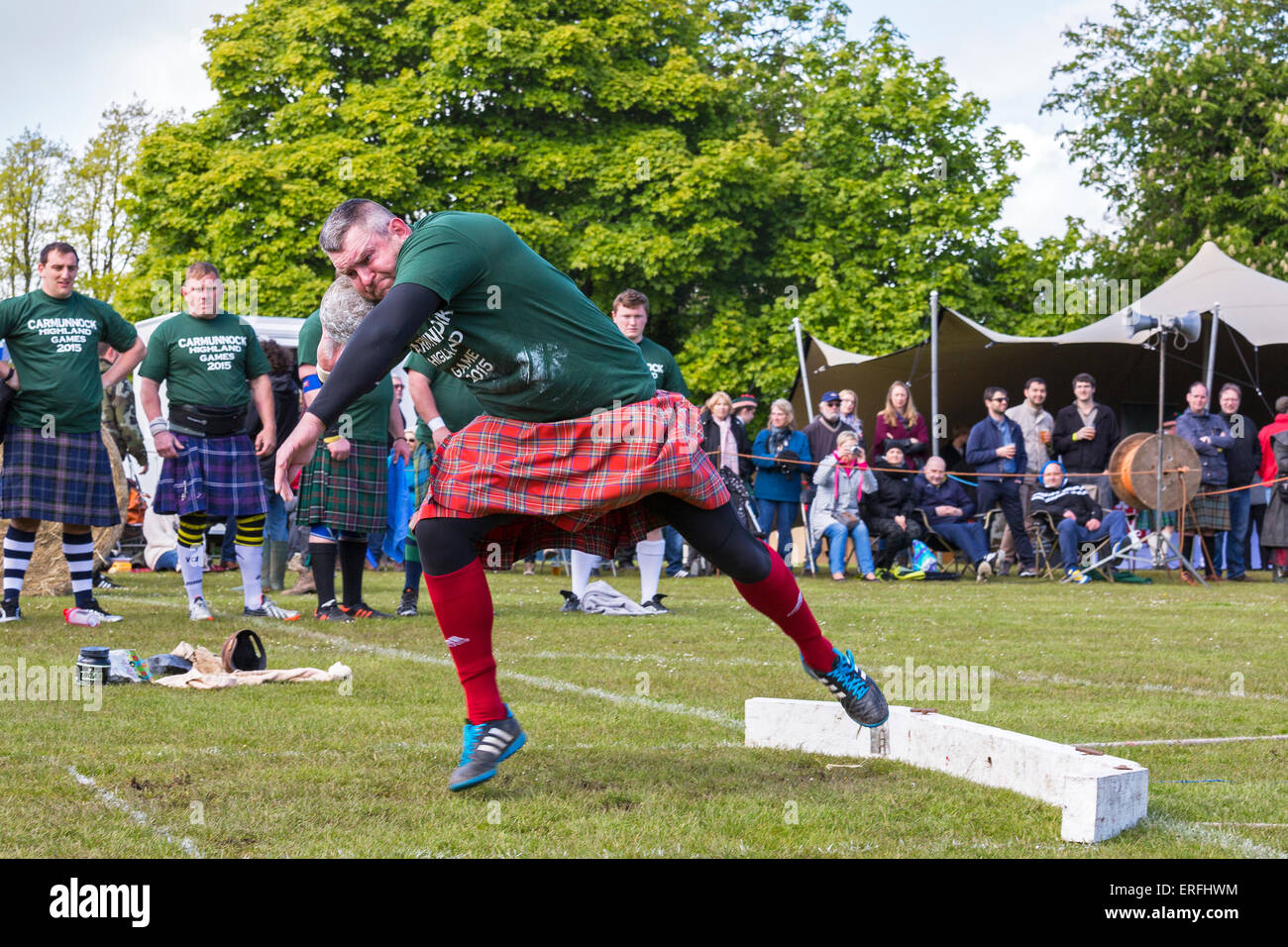 Competitor taking part in the "stone Putt" competition at Carmunnock ...