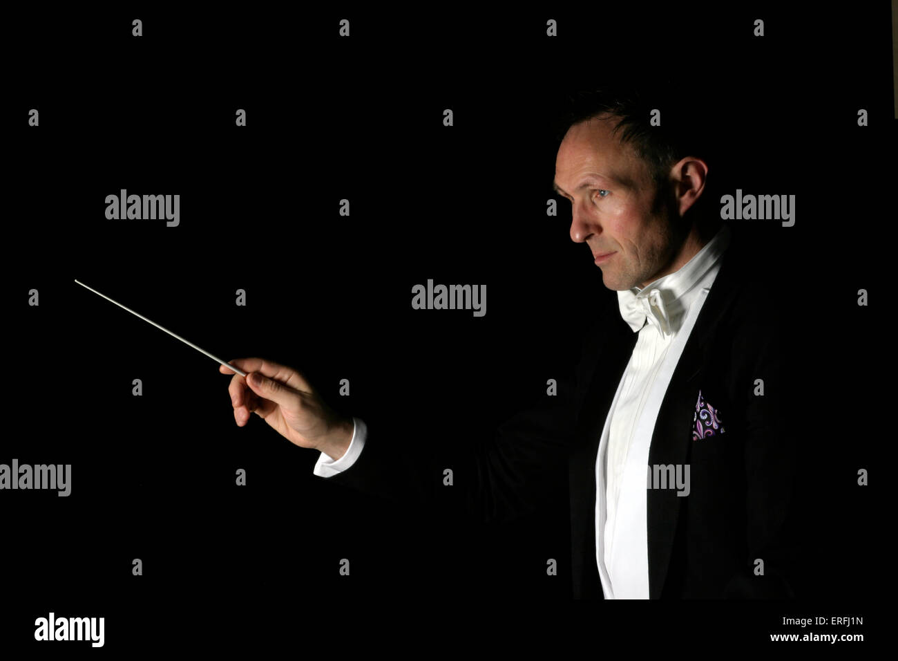Mark Eager - portrait of the British conductor conducting. Black ...