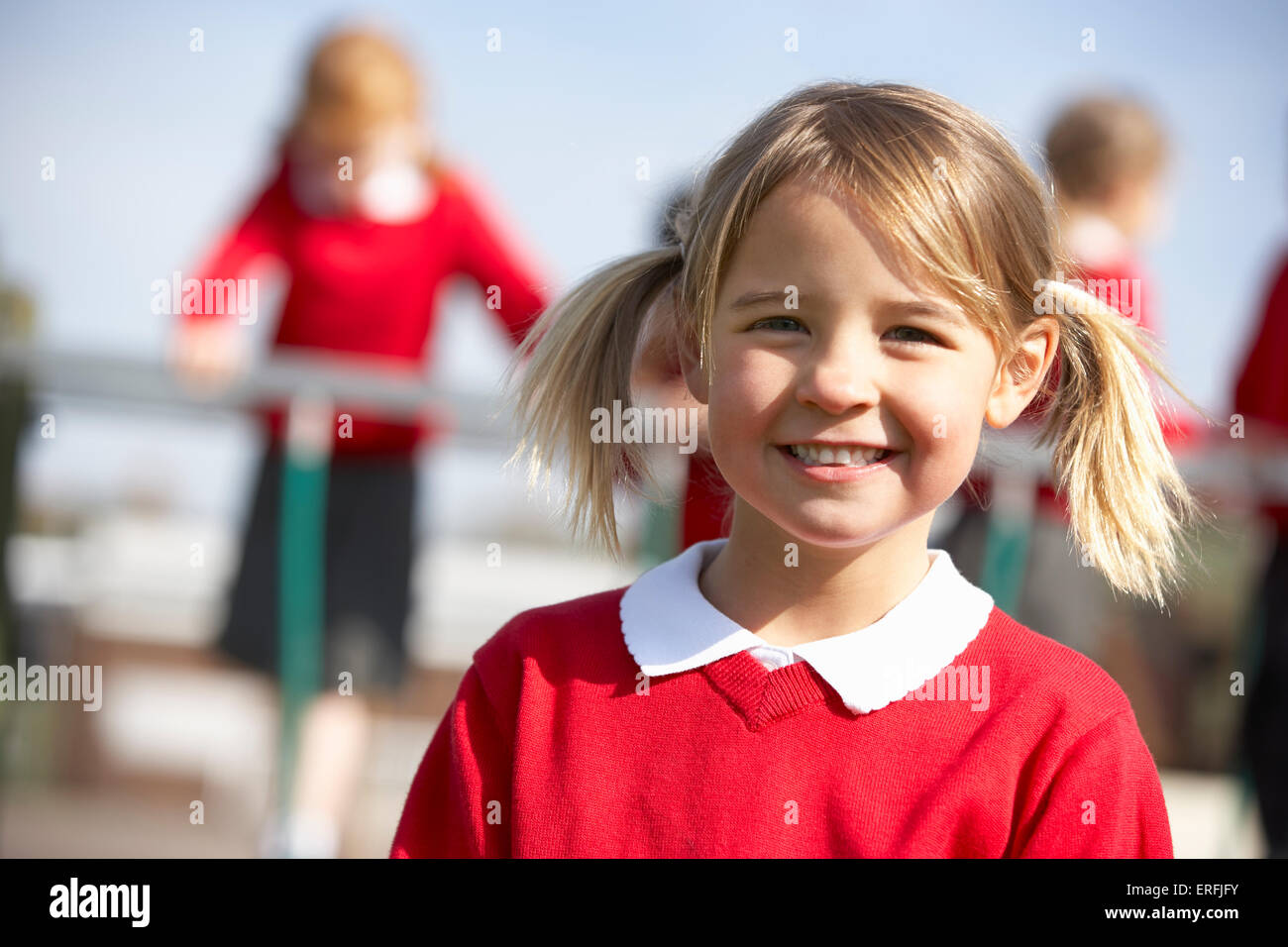 Portrait Of Female Elementary School Pupil In Playground Stock Photo ...