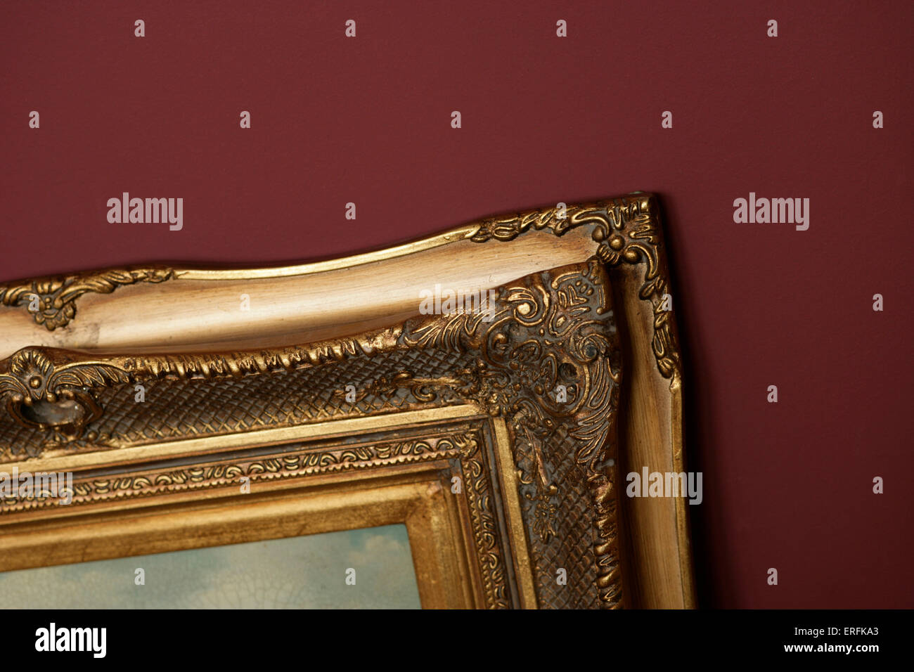 Edge of an antique picture frame. Red background Stock Photo - Alamy