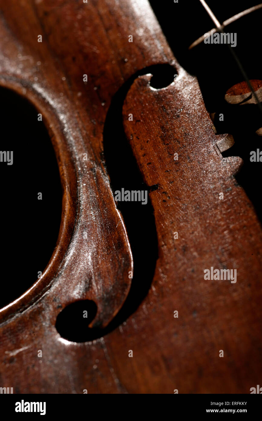 Violin - close-up of body with F hole Black background Stock Photo - Alamy
