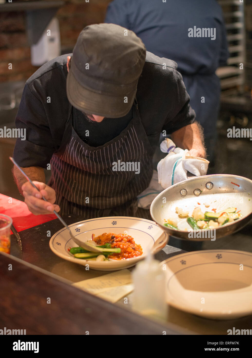 Family Fun in Montreal, Quebec, Canada. Restaurant cook hard at work ...