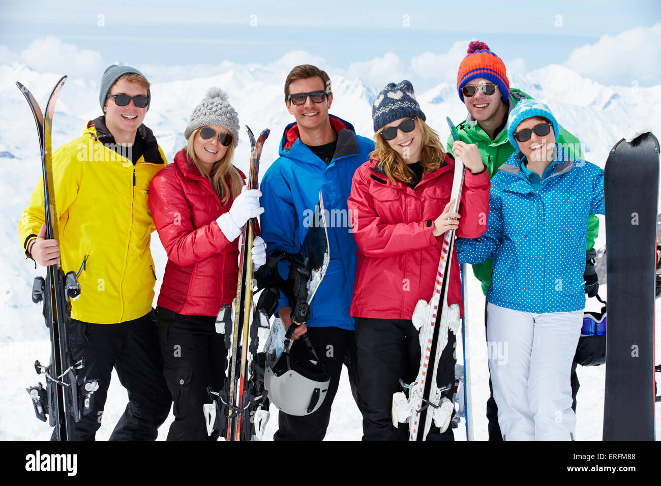 Group Of Friends Having Fun On Ski Holiday In Mountains Stock Photo - Alamy