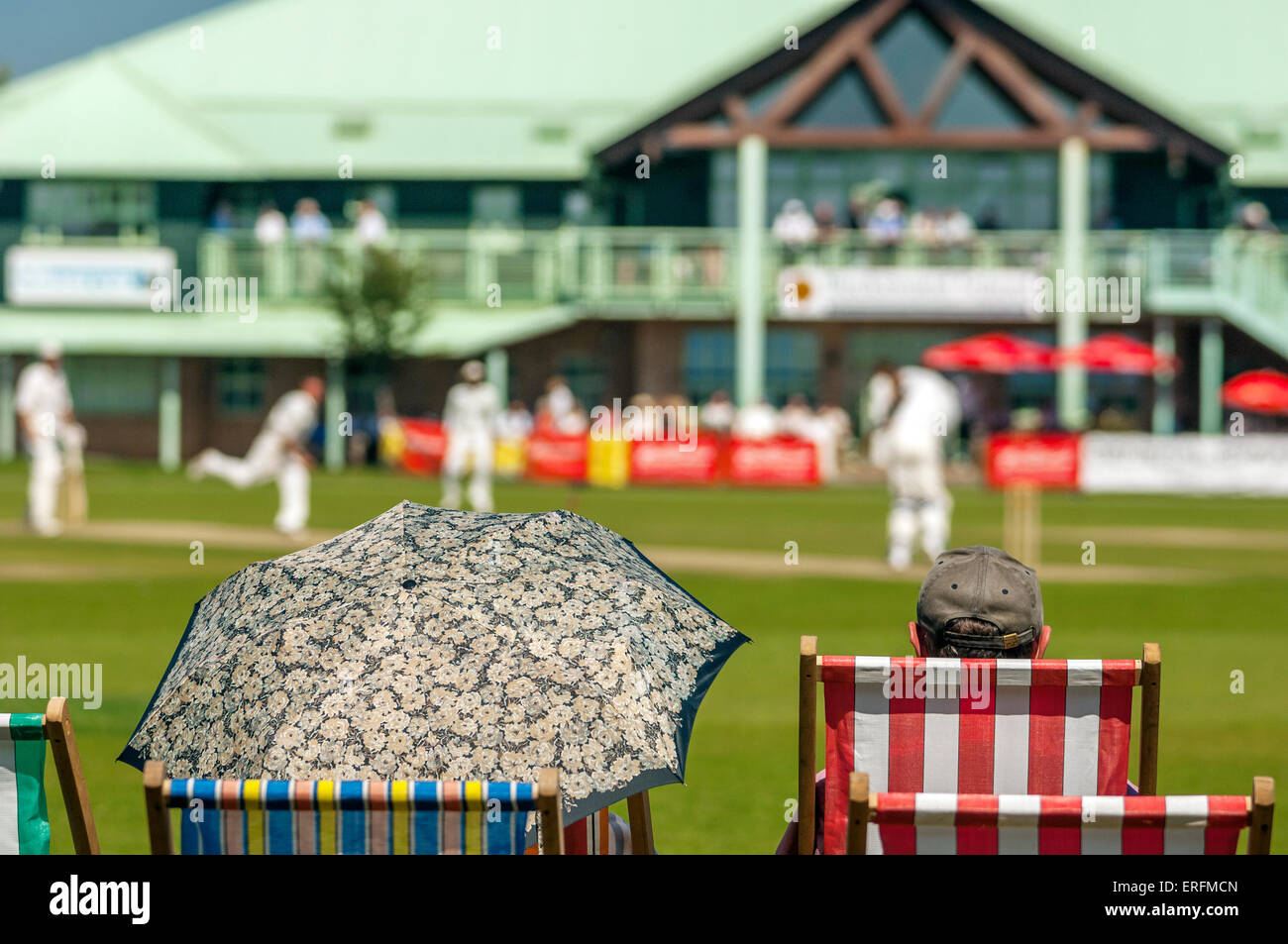 Spectators at a cricket match. Horntye Park, Hastings, East Sussex ...