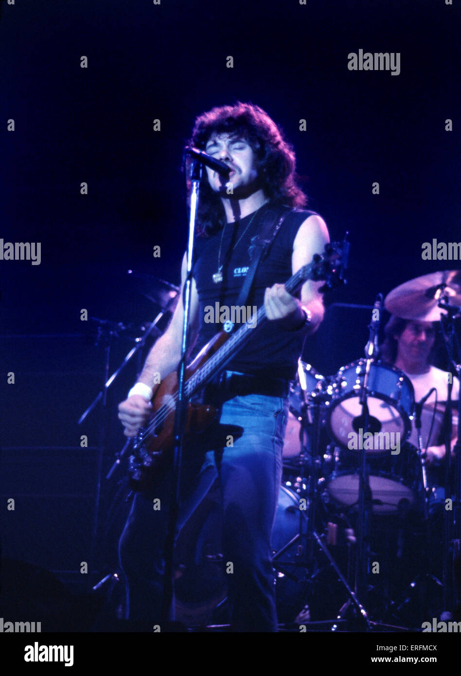 Status Quo - bassist Alan Lancaster performing at the Birmingham ...