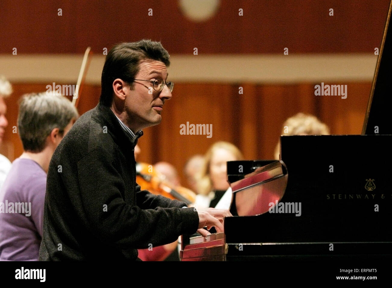 Llyr Williams - portrait of the Welsh concert pianist performing. LW: b ...