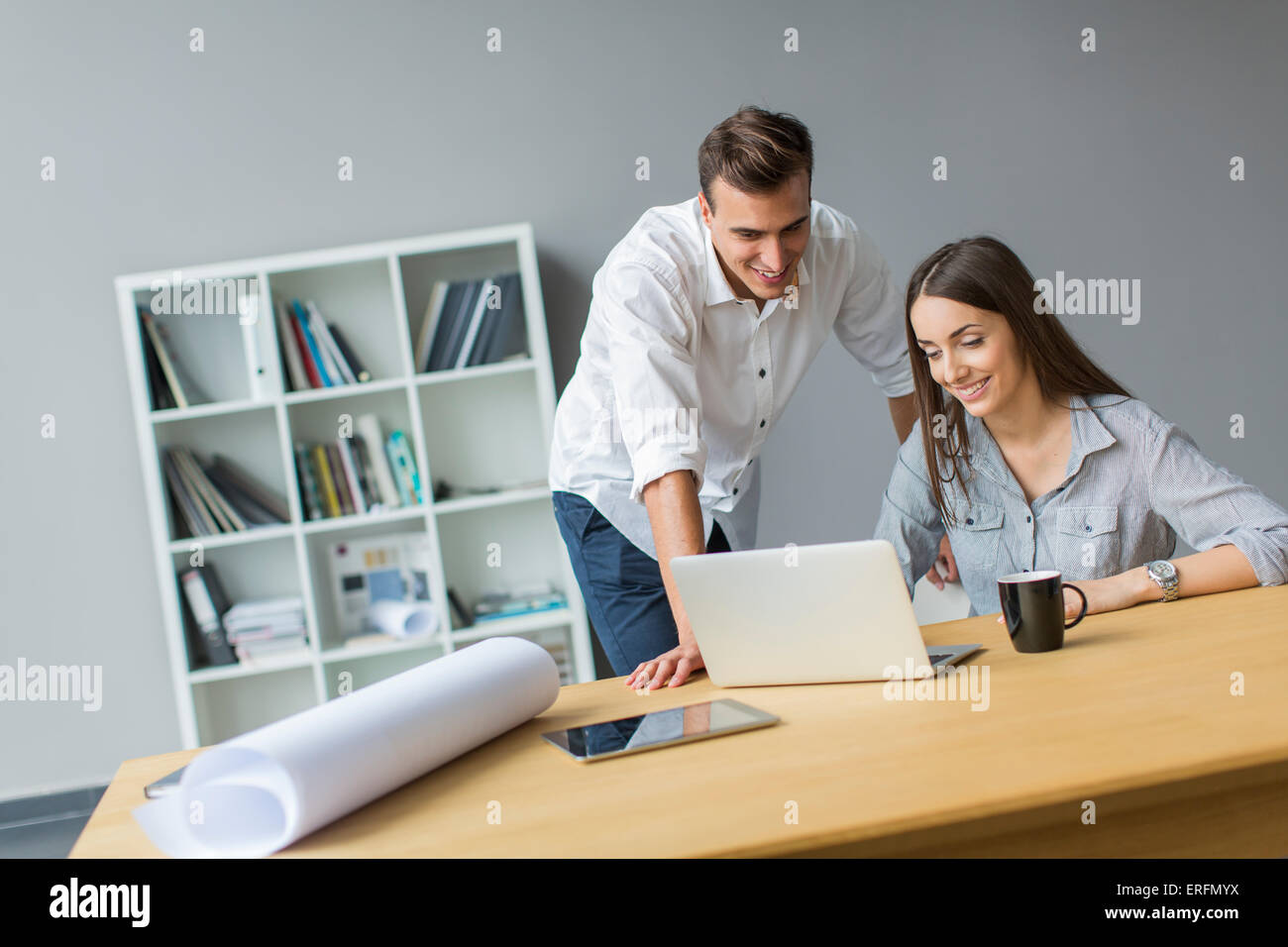 Young people in the office Stock Photo - Alamy