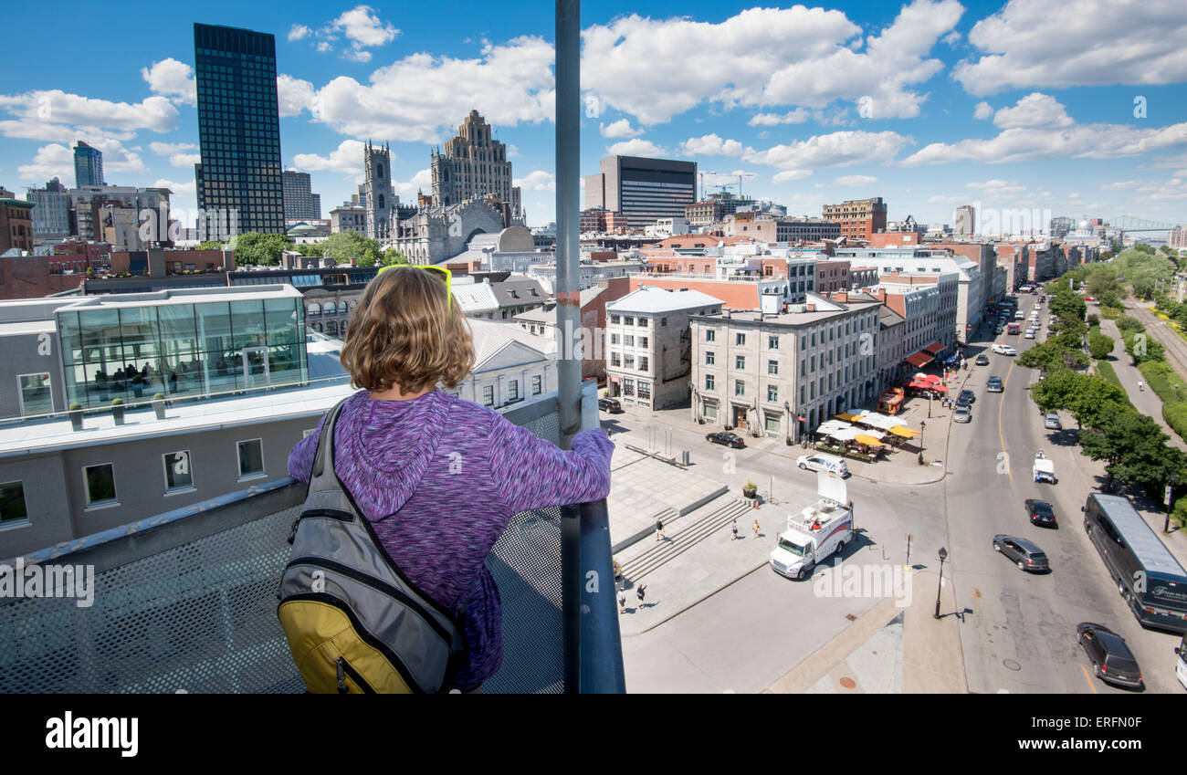 Family Fun in Montreal, Quebec, Canada. Girl looking out at the city of ...