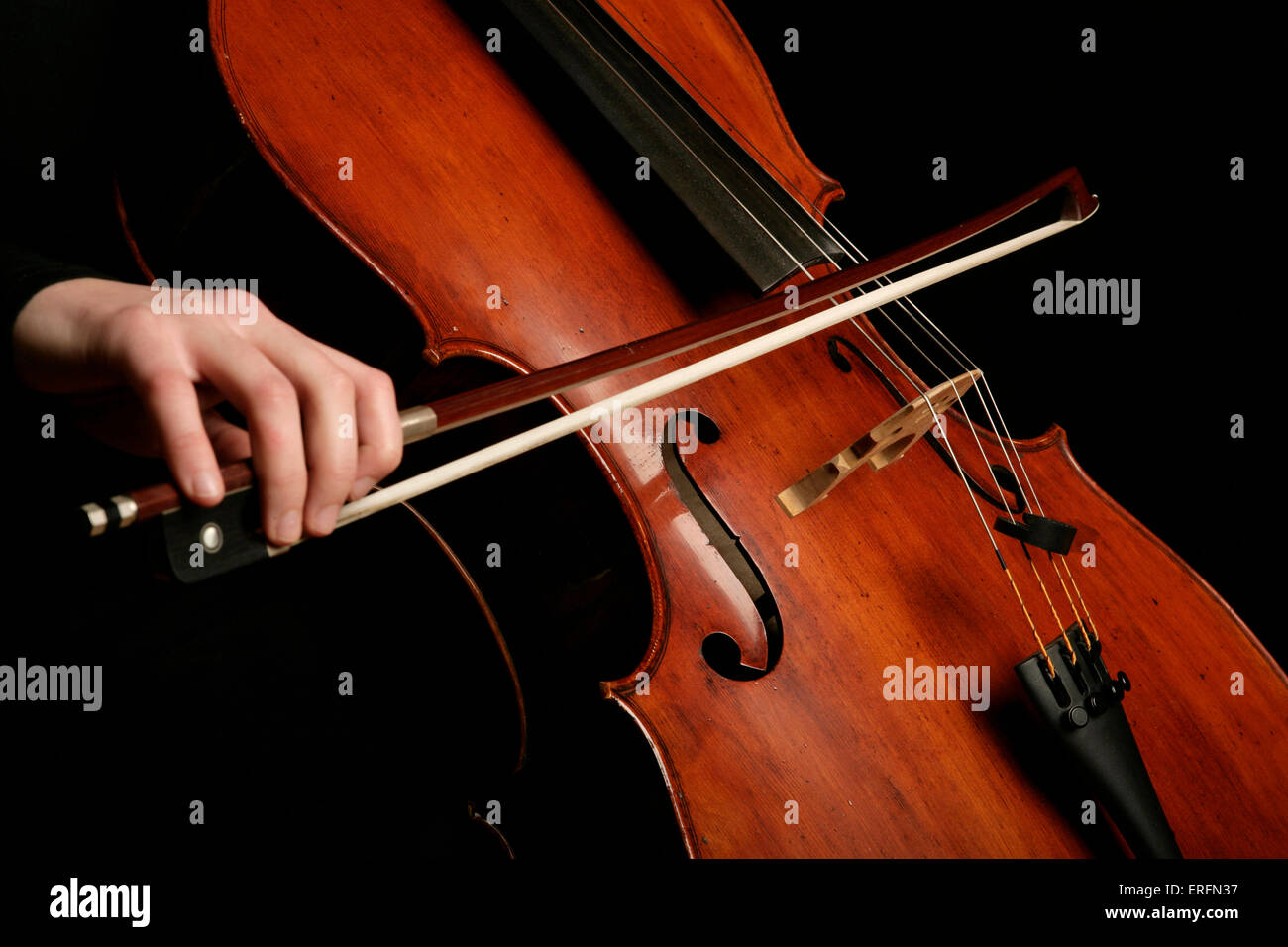 Cello - woman in playing position, cellist Stock Photo - Alamy