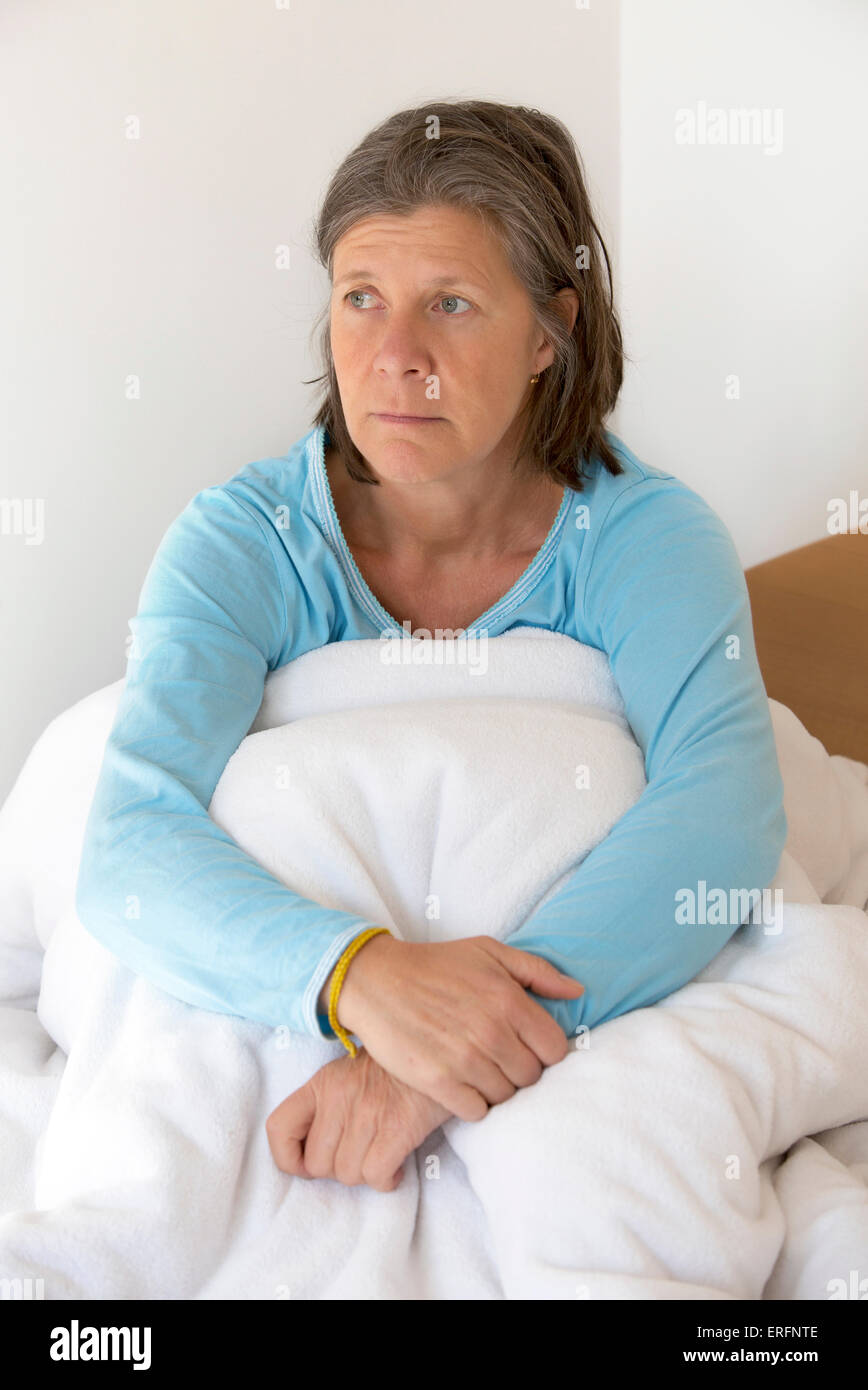 Older lady bed sad hi-res stock photography and images - Alamy