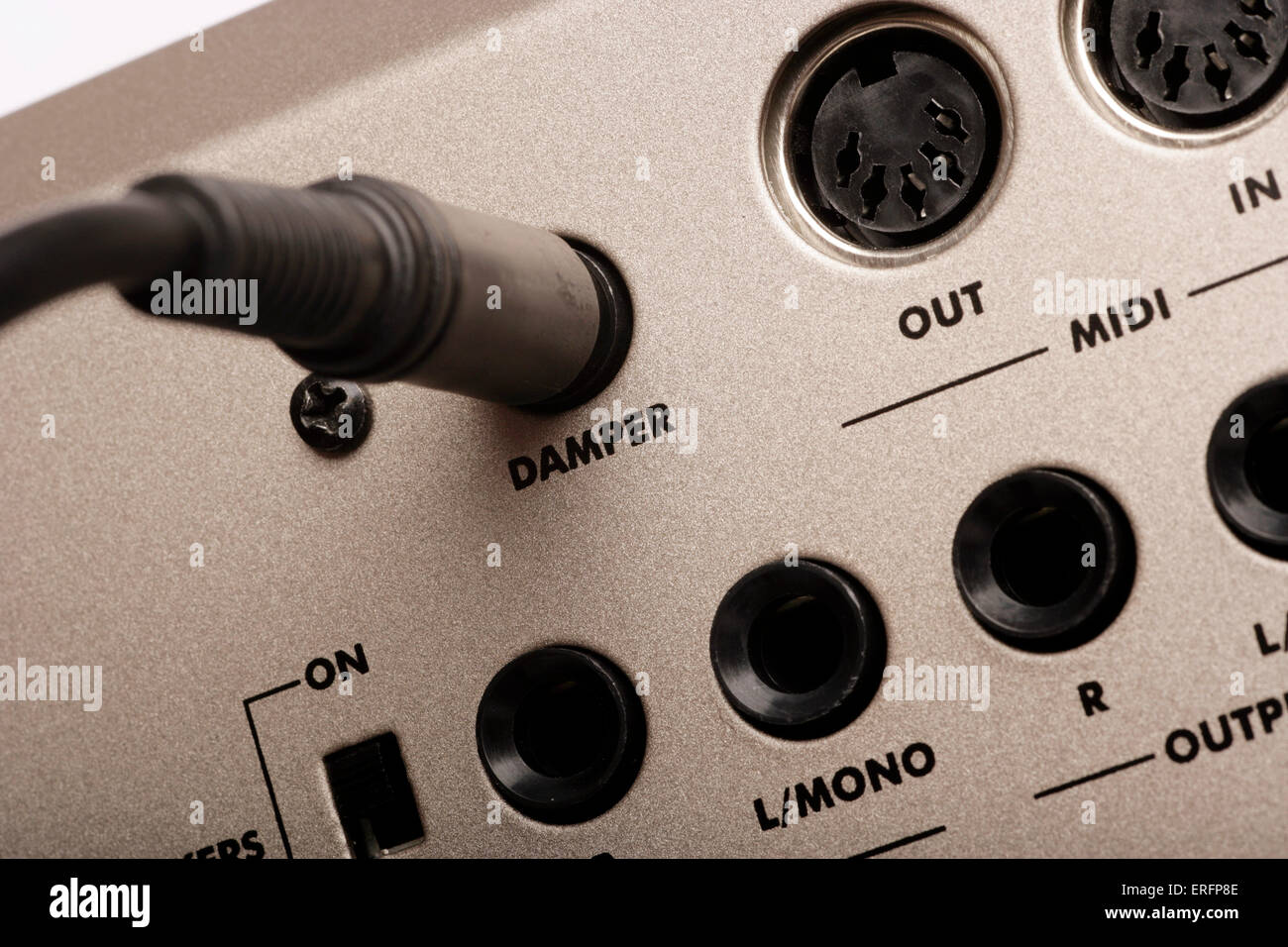Keyboard - showing sockets and jack going in to a damper socket Stock ...
