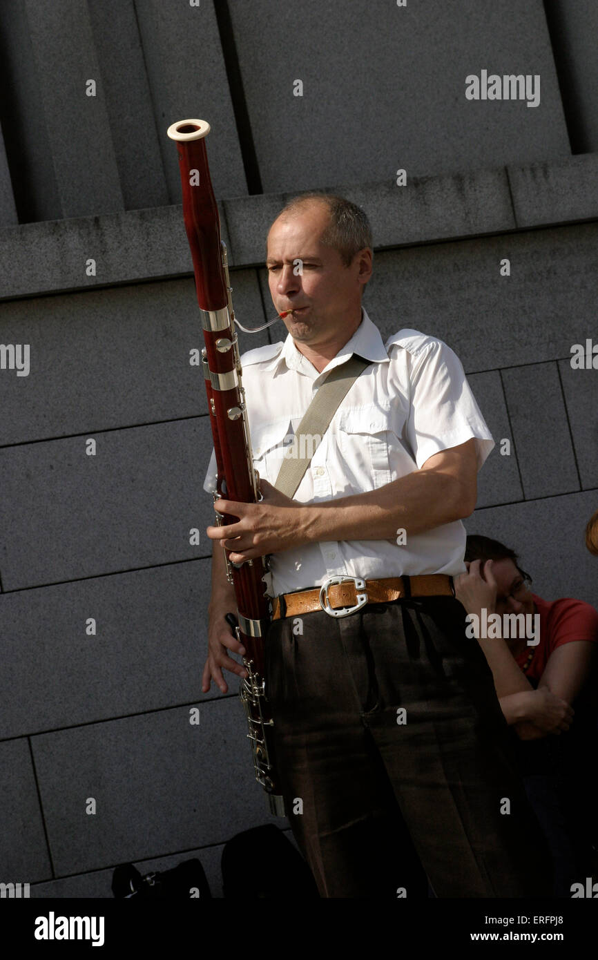 Street musician, bassoon player - in Prague Stock Photo - Alamy