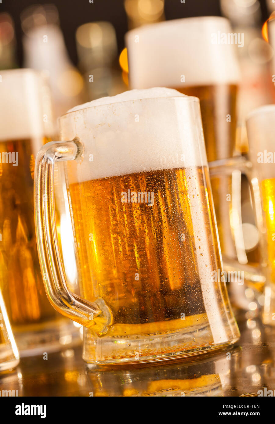 Jug of beer placed on bar counter Stock Photo - Alamy